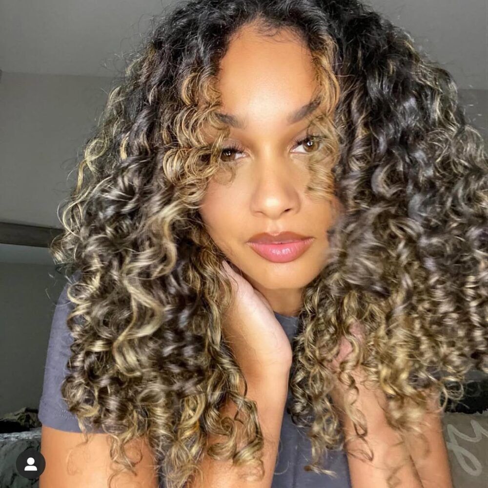 8 Curly Hairstyles That Will Dominate in 2025 - NewBeauty