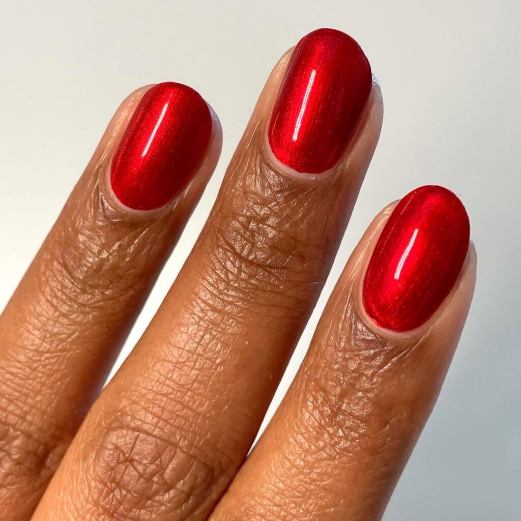 The Red Nail Colors Nail Artists Love on Deep Skin Tones