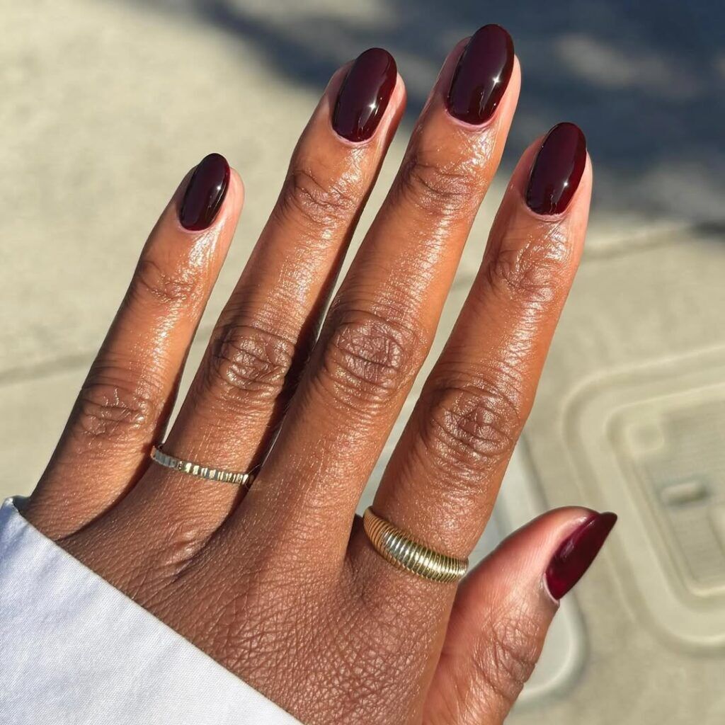 The Red Nail Colors Nail Artists Love on Deep Skin Tones